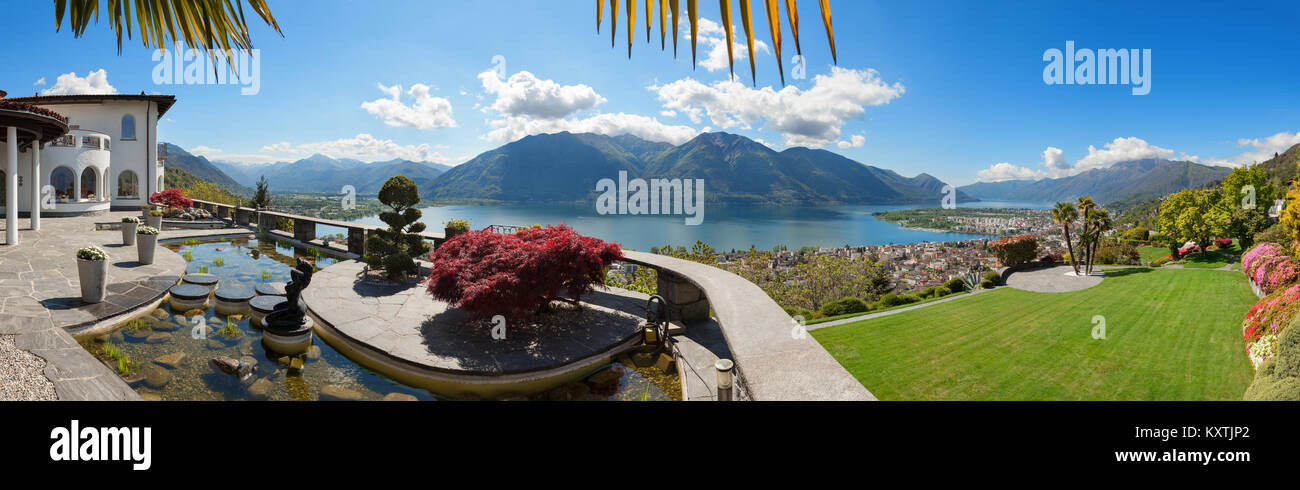 beautiful terrace with ornamental garden of a villa, lake view Stock ...