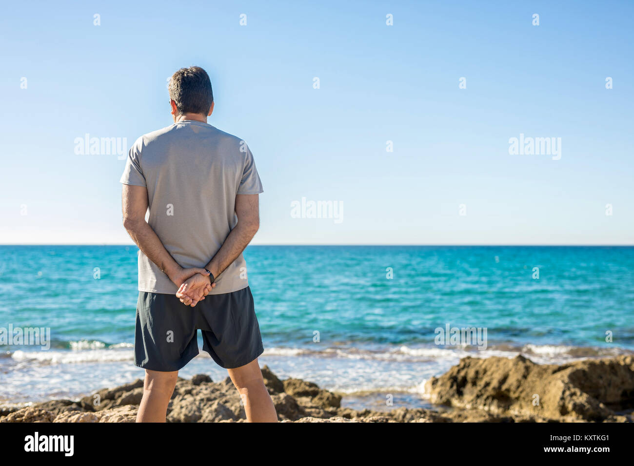 Man taking break on coast Stock Photo - Alamy Man taking break on coast Stock Photo - Alamy