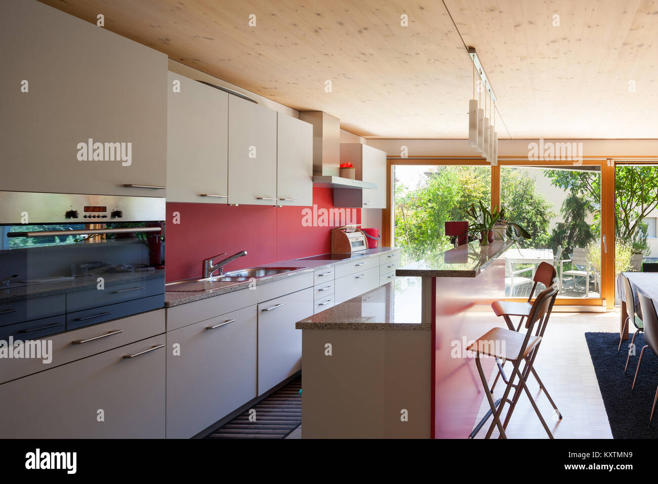 Interior of an eco house, modern kitchen Stock Photo - Alamy