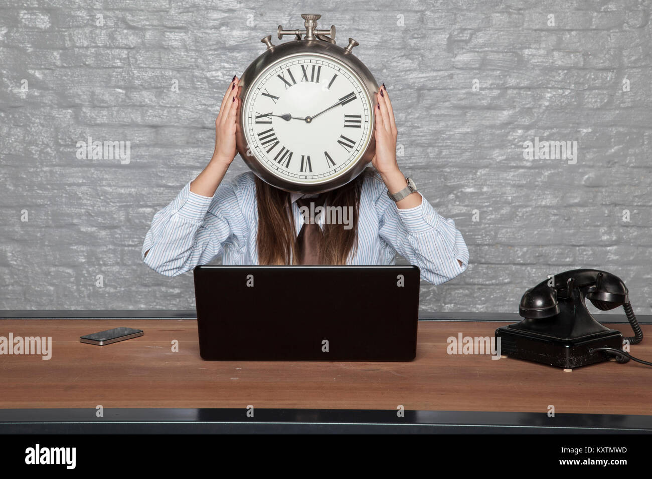 clock instead of the head, time is business Stock Photo - Alamy