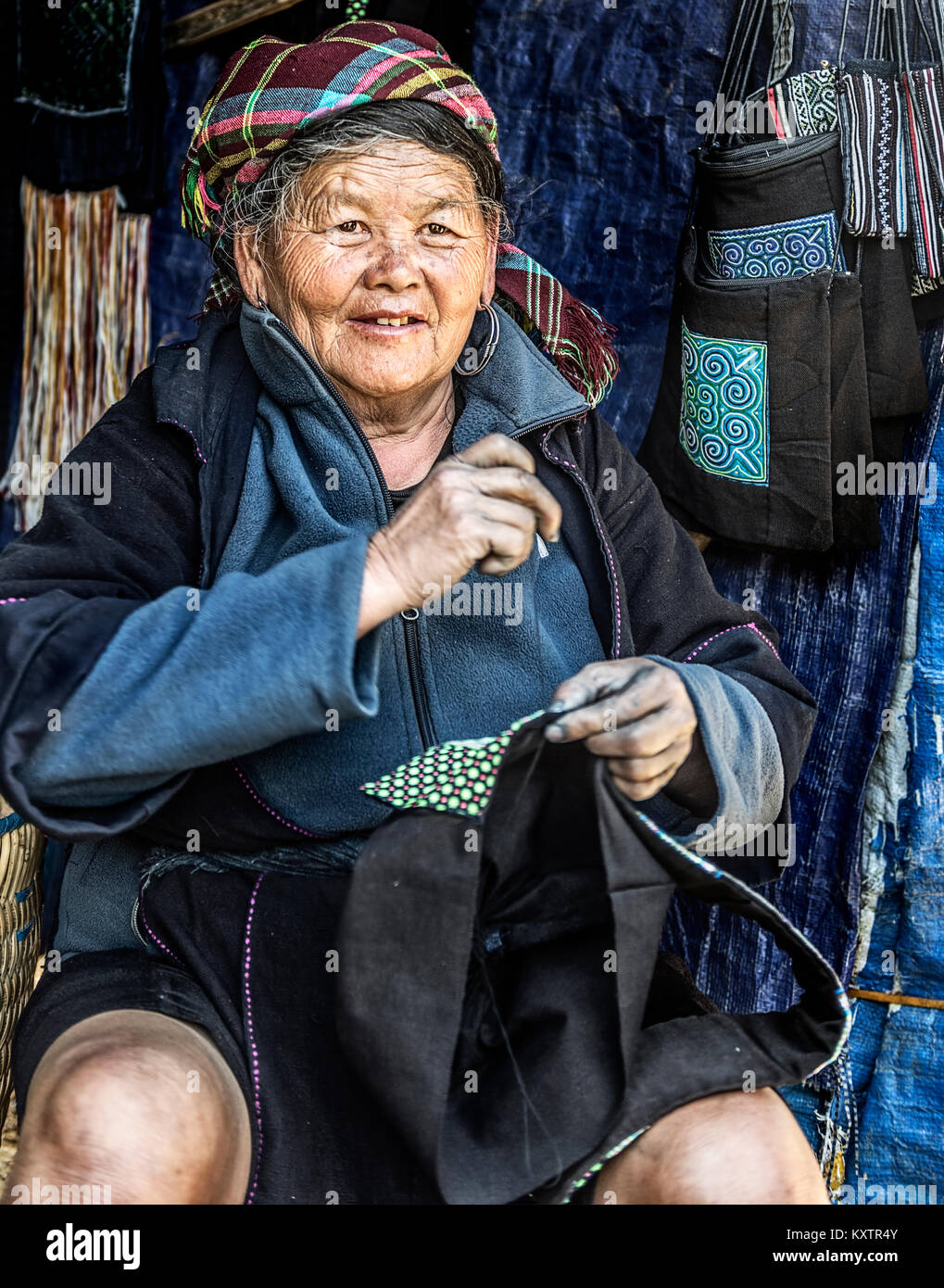 Hmong tribe woman working outside her house, Sapa, Vietnam Stock Photo ...