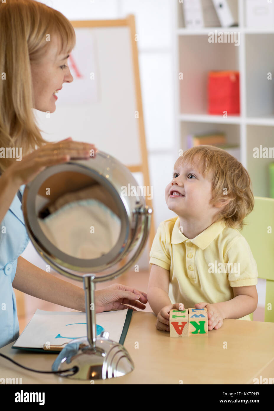 Cute kid little boy at speech therapist office Stock Photo - Alamy