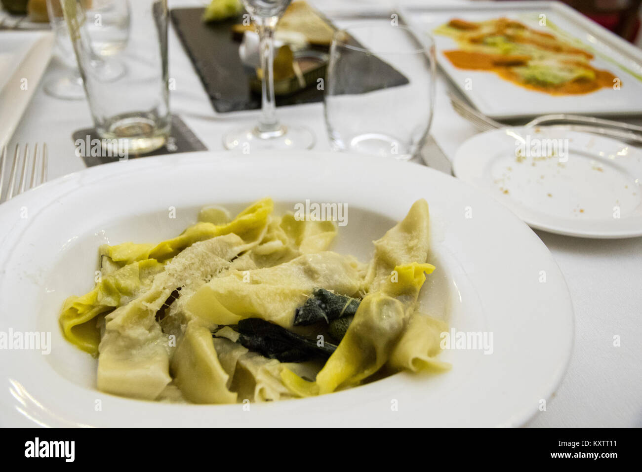 Traditional pasta dinner meal in a restaurant in Rezzato, northern ...