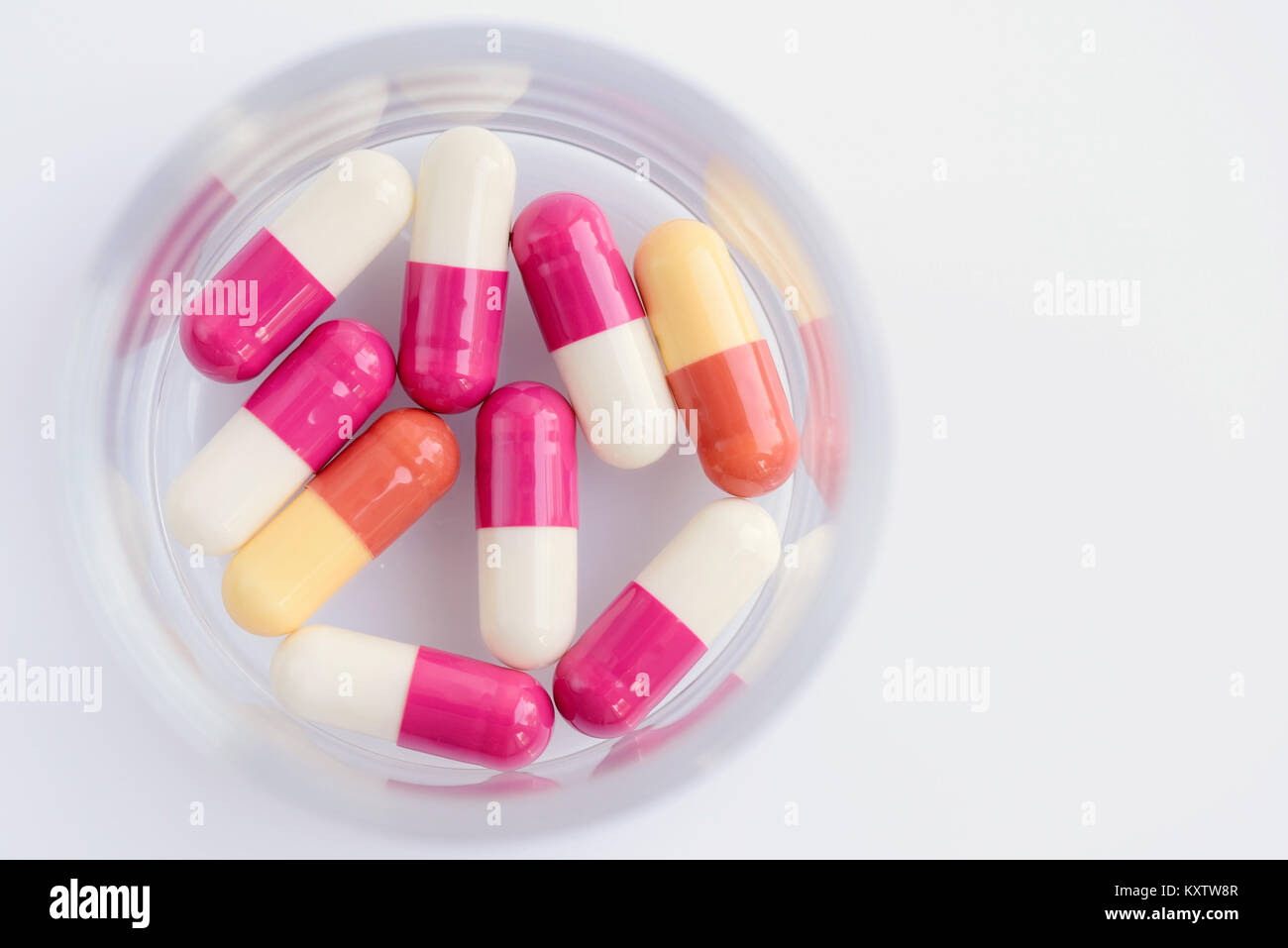 Close-up of medical capsule in a glass (top view Stock Photo - Alamy