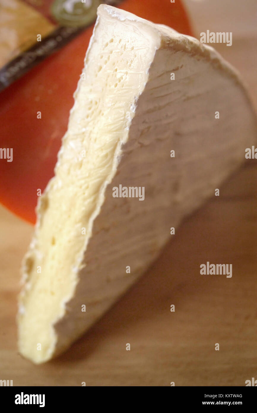 Wedge of soft cheese Stock Photo - Alamy