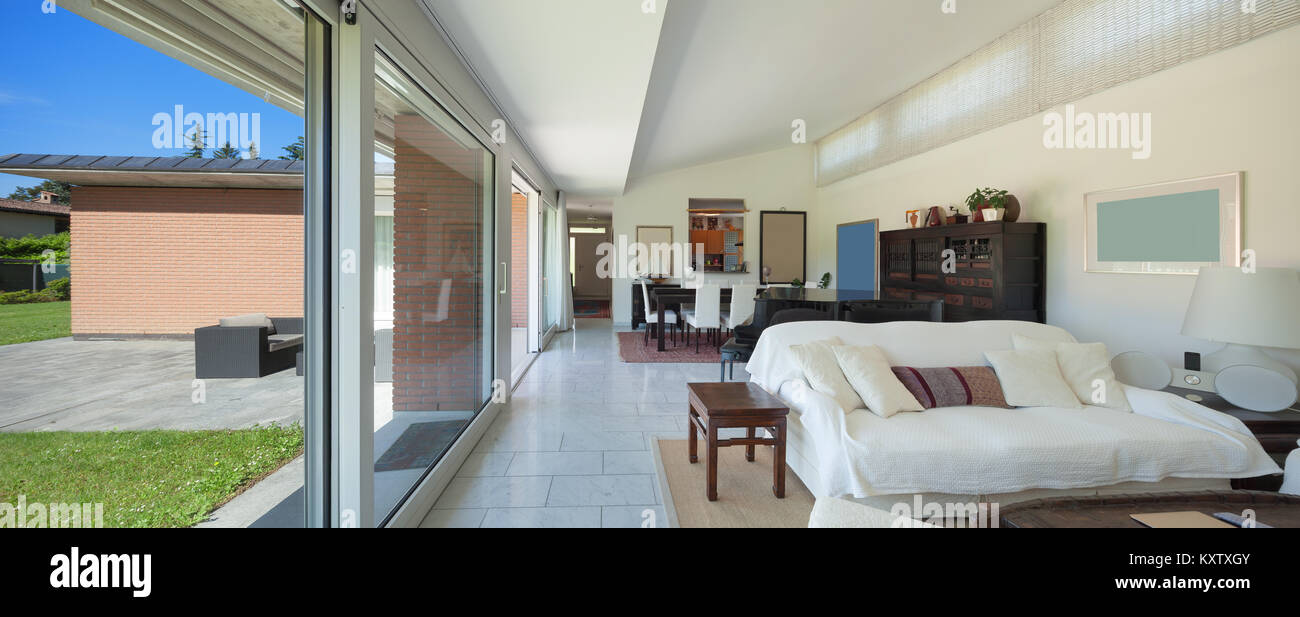 living room of a modern house, big windows, interior Stock Photo - Alamy