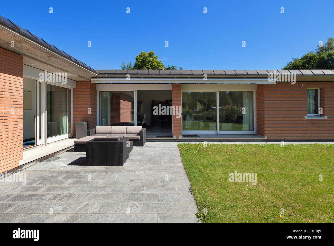Architecture, veranda of a brick house, outdoors Stock Photo - Alamy