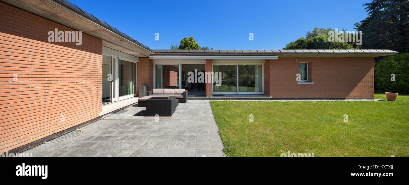 Architecture, veranda of a brick house, outdoors Stock Photo - Alamy