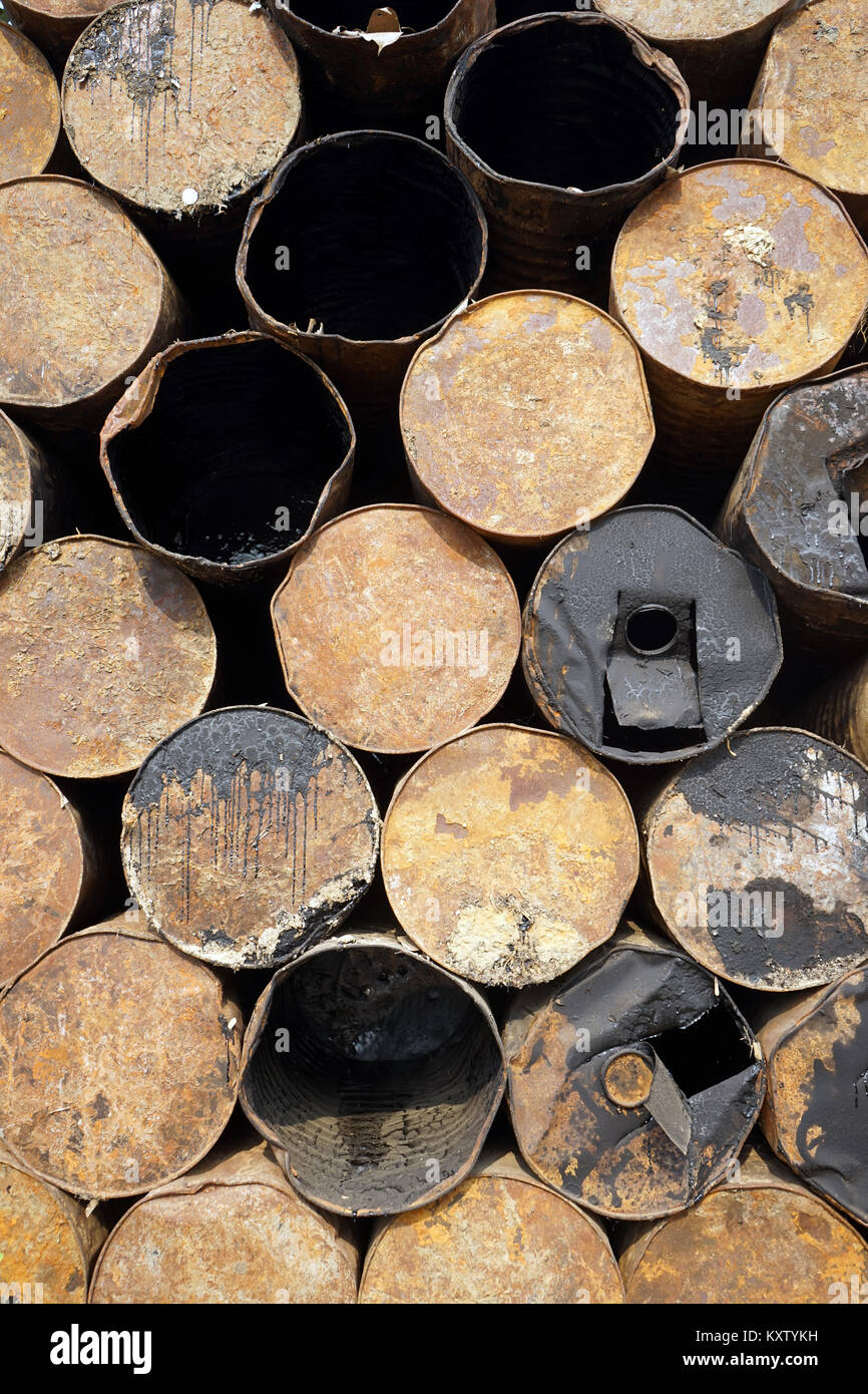 A rows of oil barrels in storage room Stock Photo - Alamy