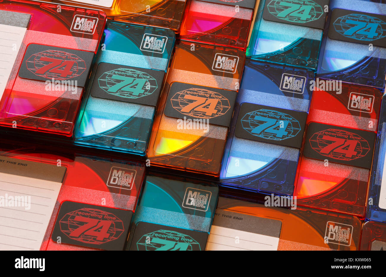 A few rows of blank colorful audio minidiscs media cartridges with a ...