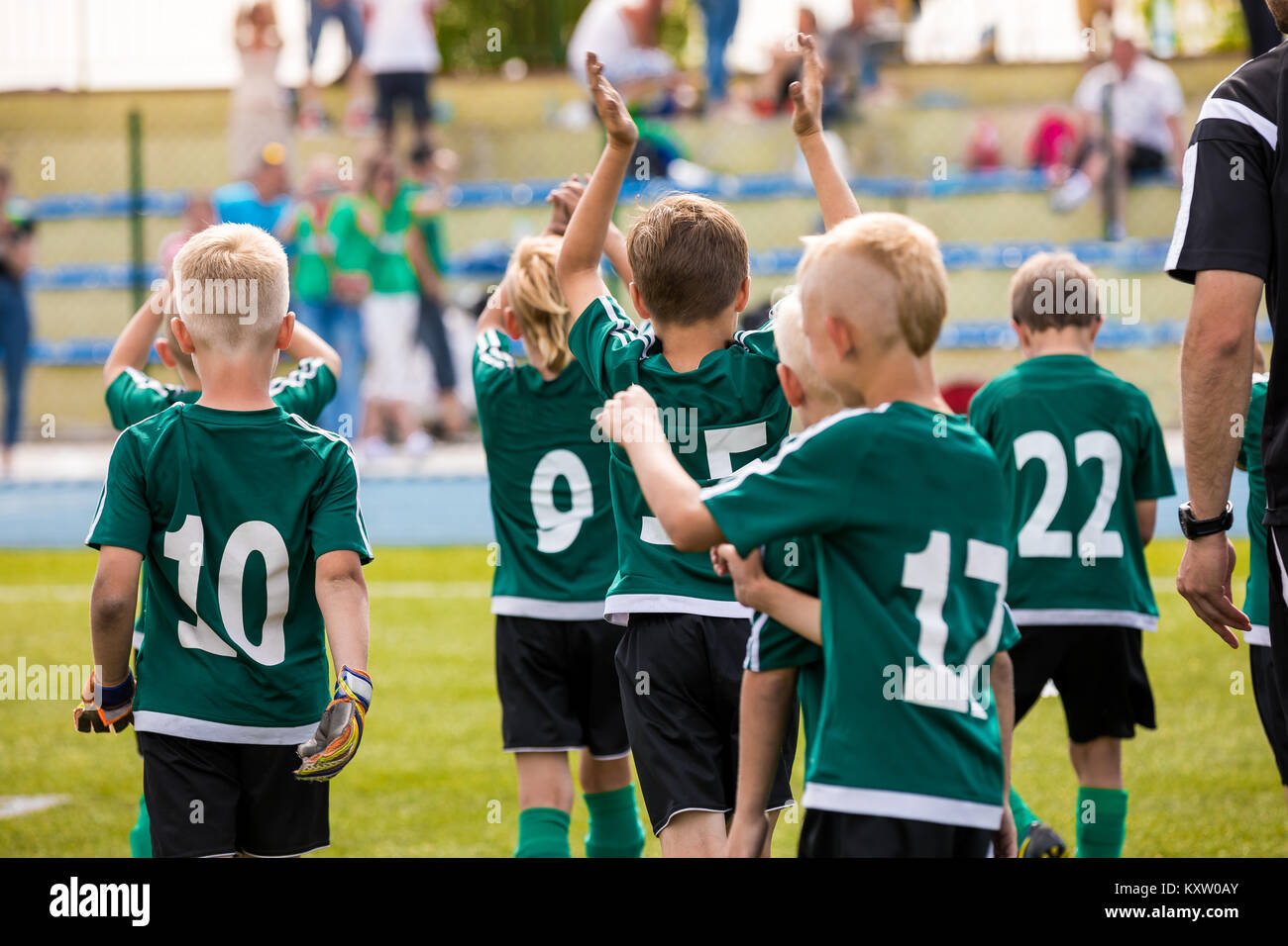 Soccer players holding trophy High Resolution Stock Photography and ...