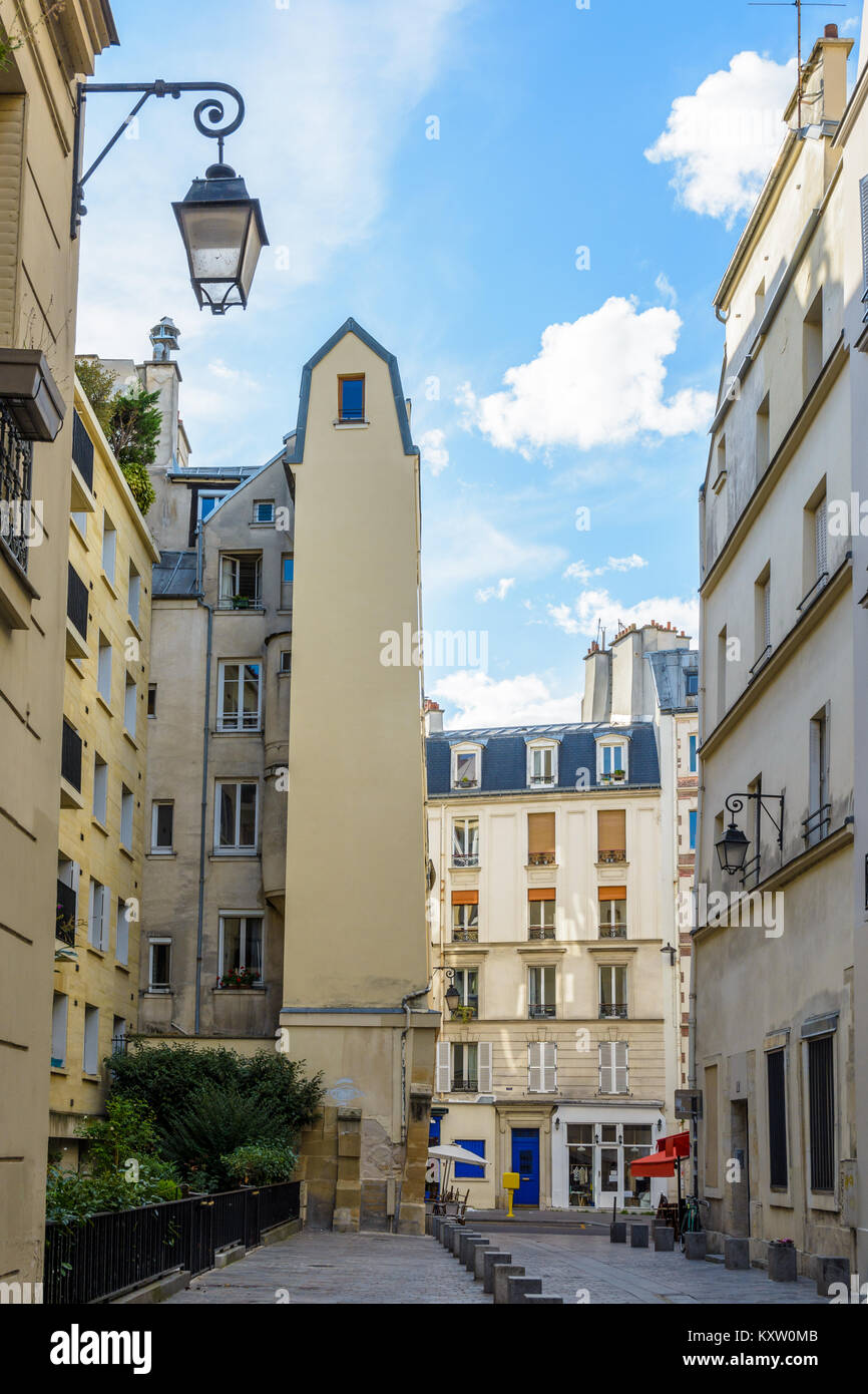 A narrow building in a small pedestrian street in the historic center ...