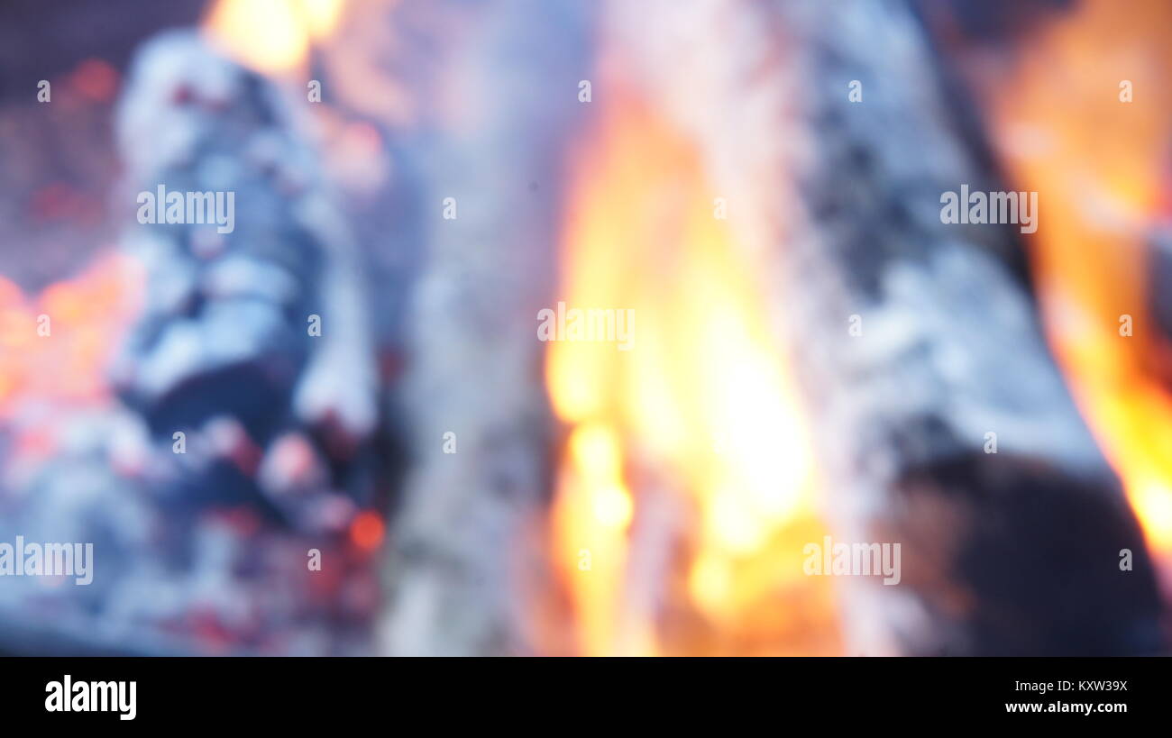 Burning fire wood and ember. light, textures background Stock Photo - Alamy