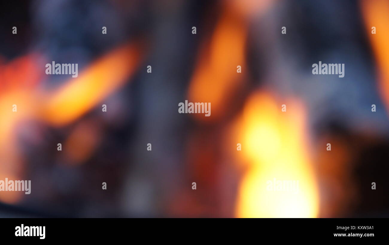 Burning fire wood and ember. light, textures background Stock Photo - Alamy