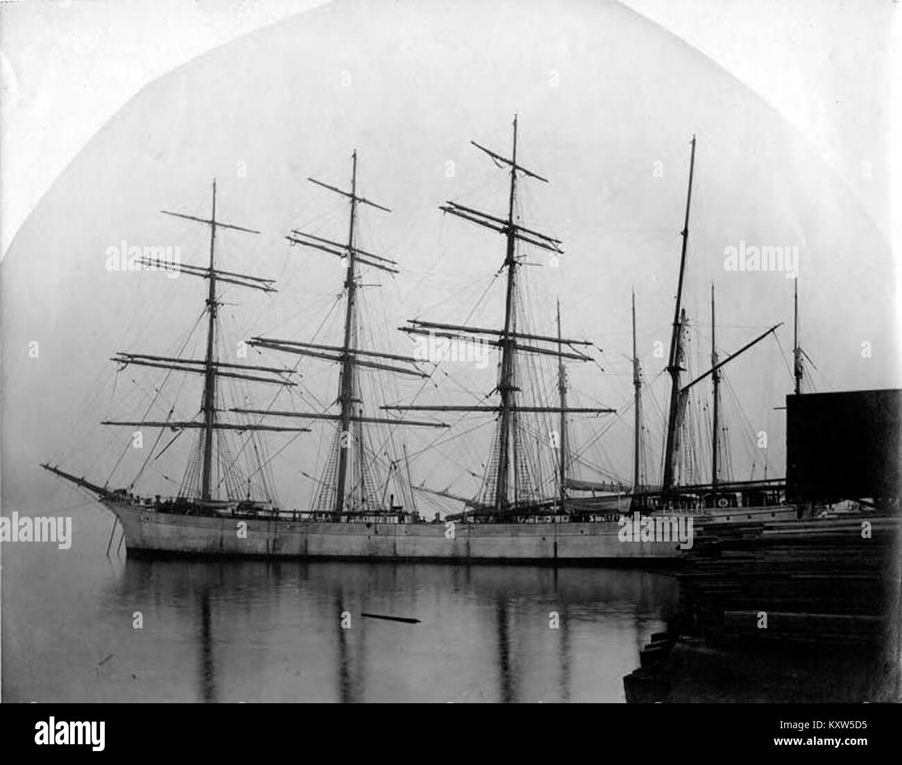 The four-masted bark Falls of Garry is shown docked in port in ...