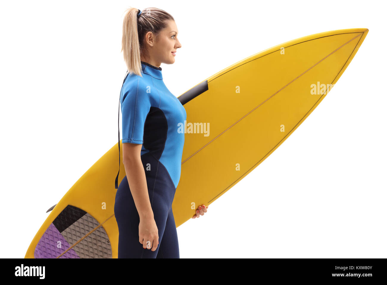 Profile shot of a female surfer with a surfboard isolated on white ...