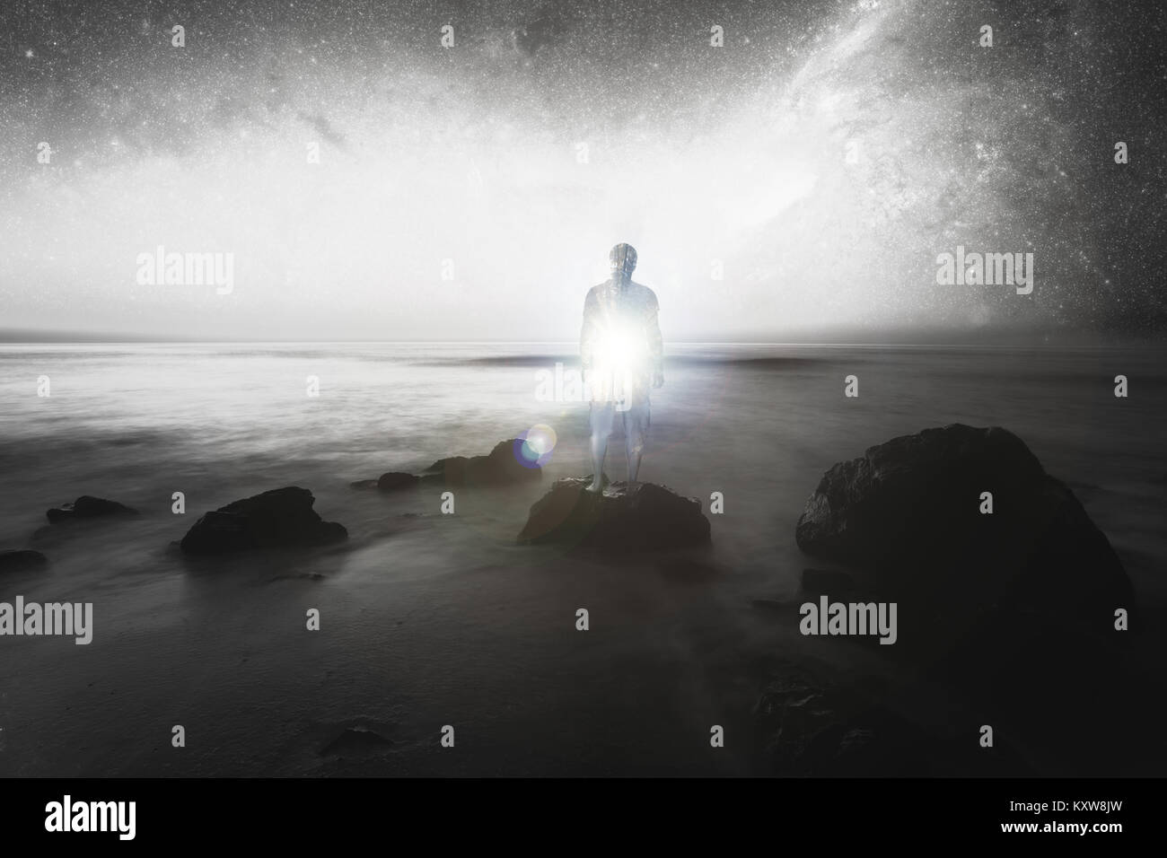 double exposure, man on the beach rocks, inside light, conceptual image ...