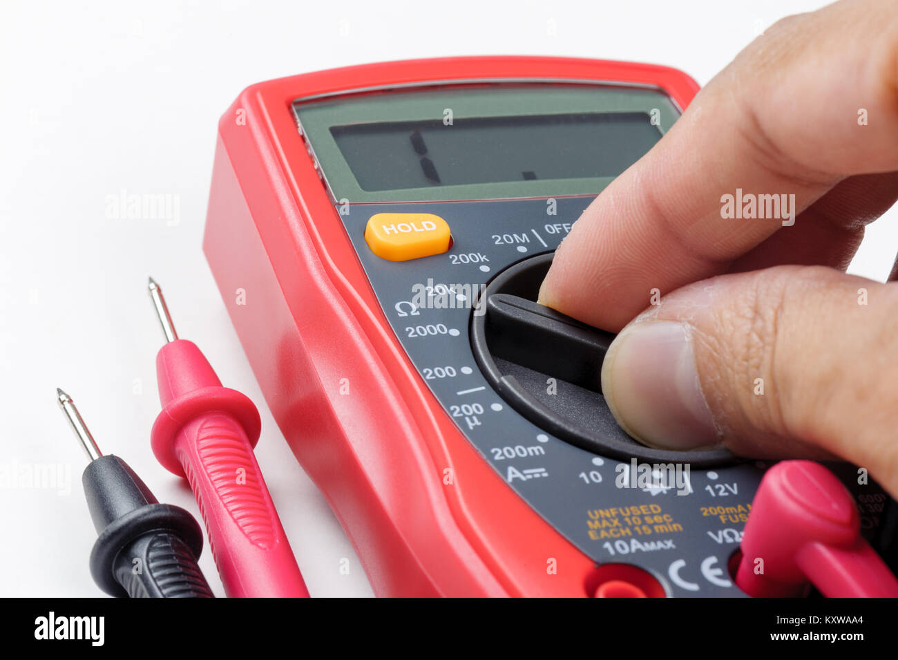 electrician switching the selector of multimeter Stock Photo - Alamy