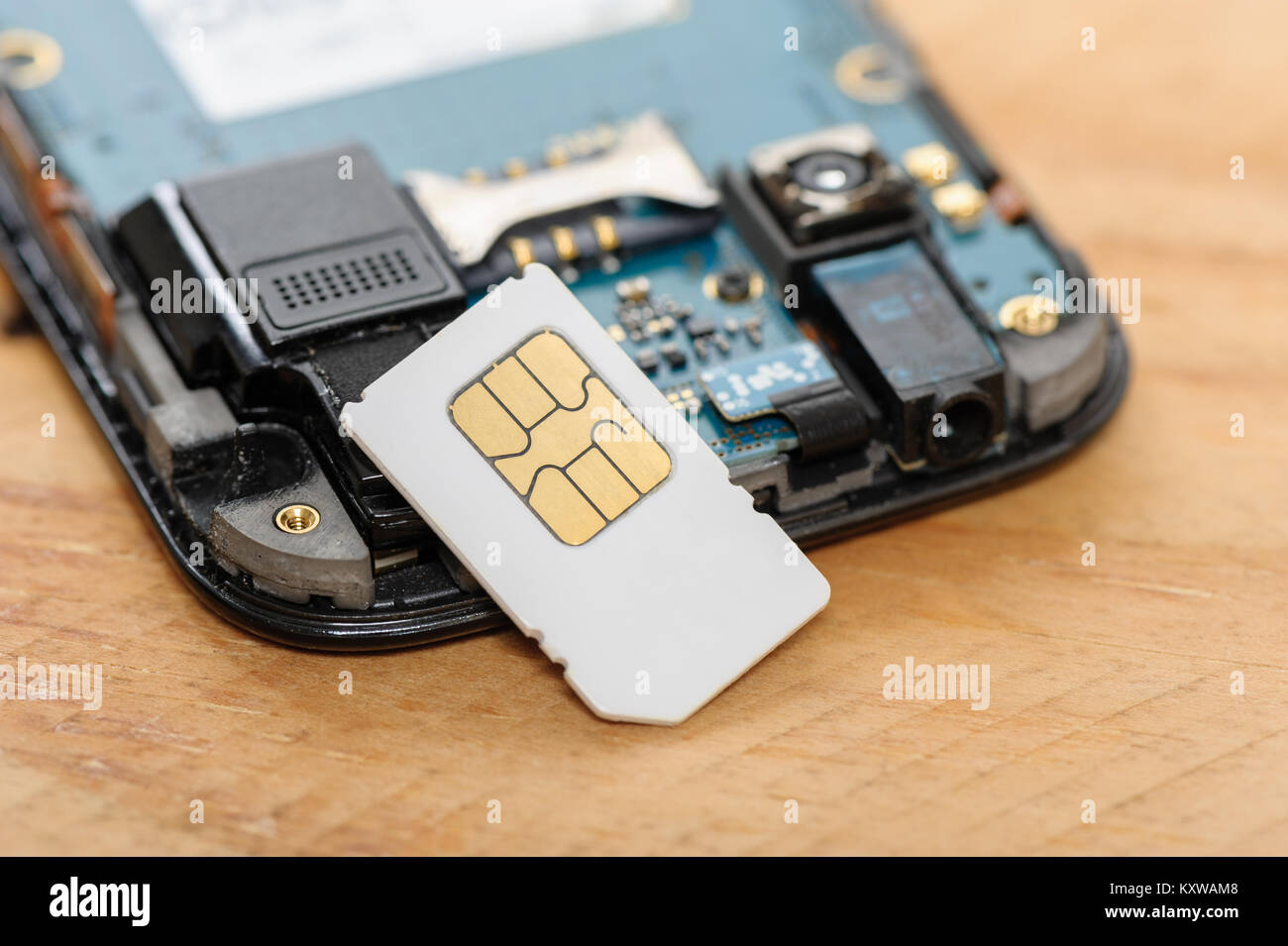 mini size of SIM card with smart phone Stock Photo - Alamy