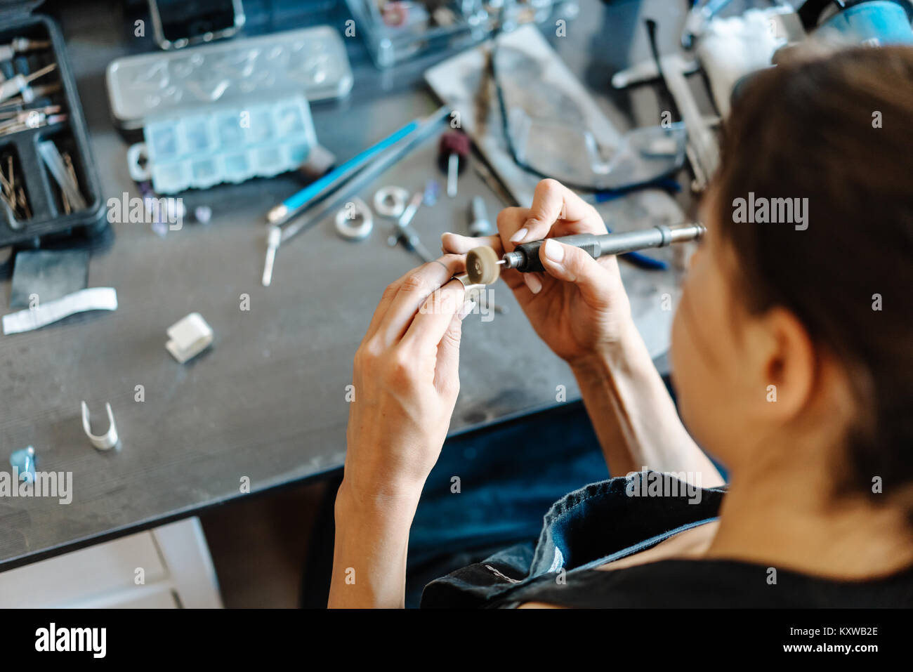 The girl is engaged in jewelry business Stock Photo - Alamy