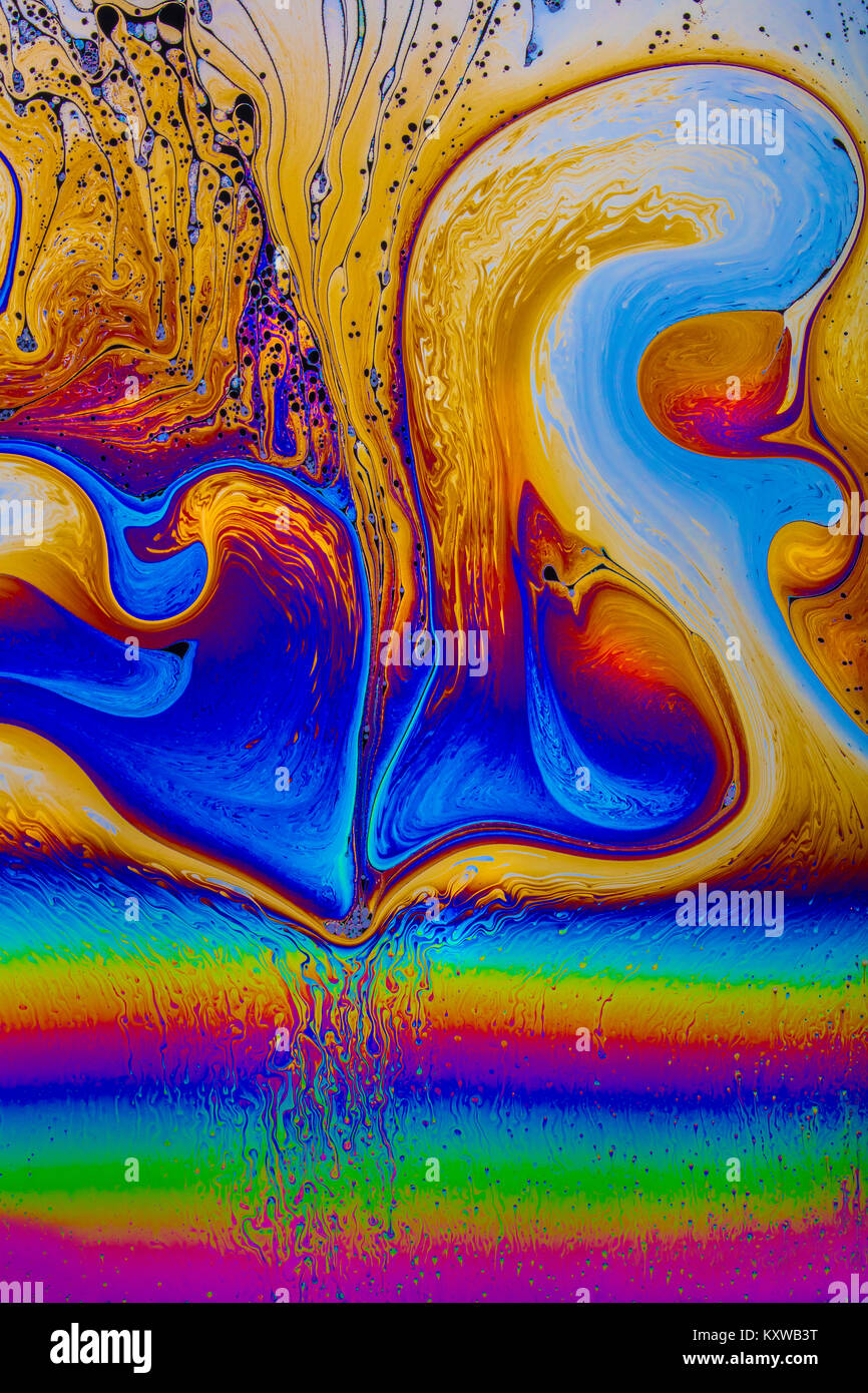 Optical thin film interference patterns in a stretched soap solution ...