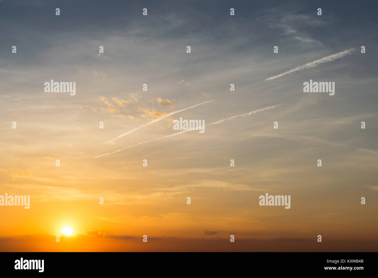 Hot summer sun on the sunset after a hot day background Stock Photo - Alamy