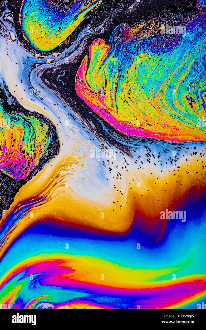 Optical thin film interference patterns in a stretched soap solution ...