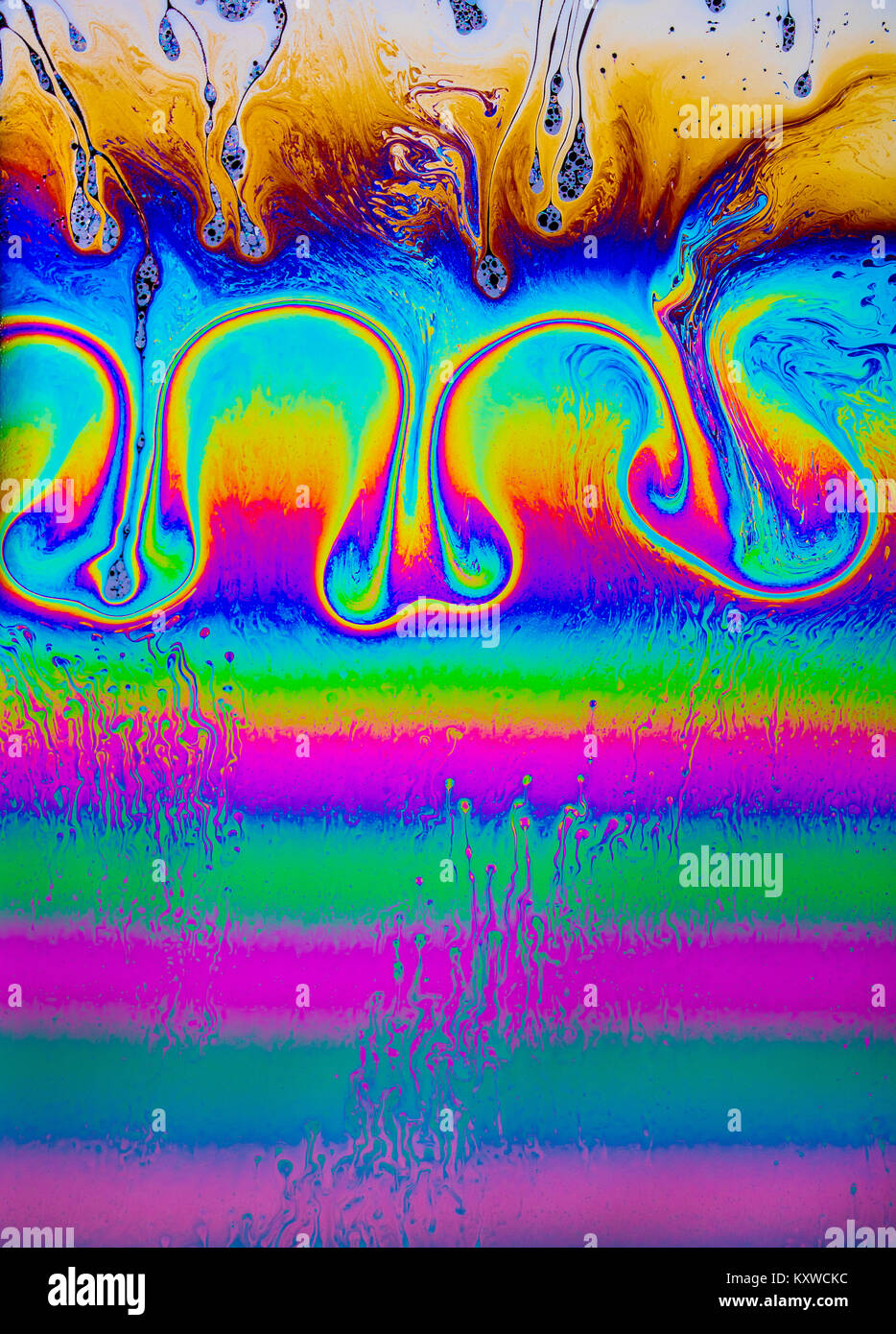 Optical thin film interference patterns in a stretched soap solution ...