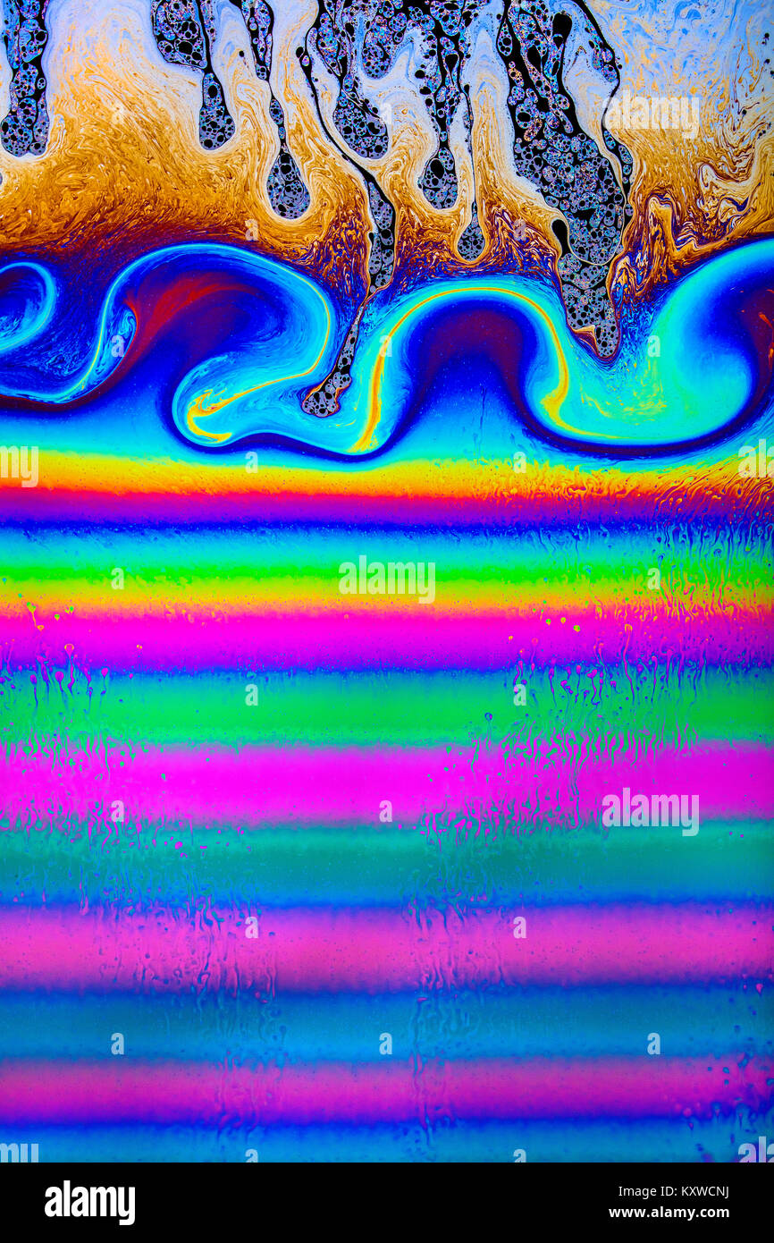 Optical thin film interference patterns in a stretched soap solution ...