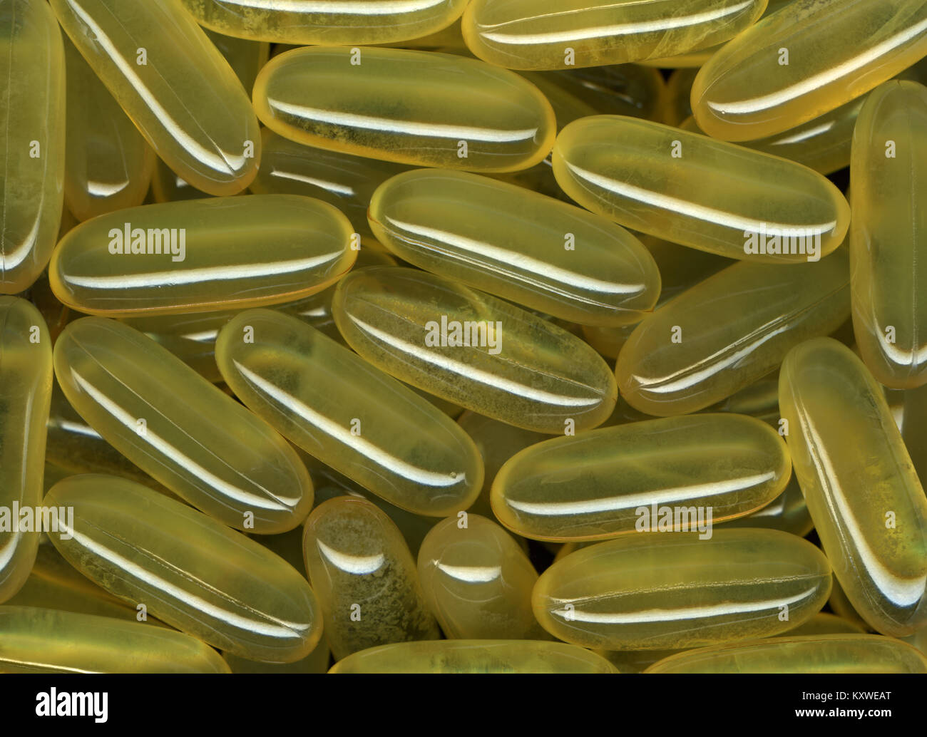 Fish oil capsules close up Stock Photo - Alamy