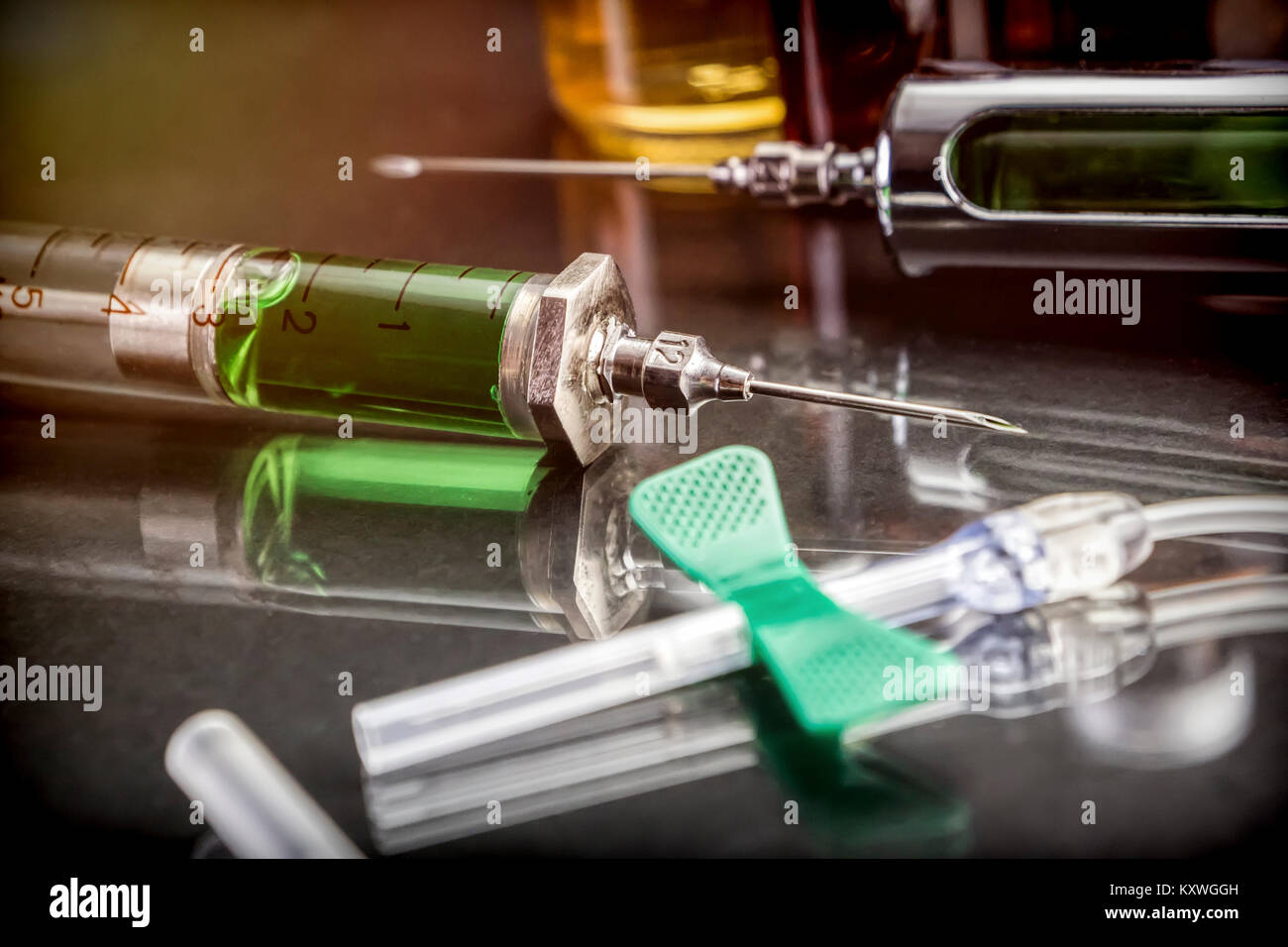 Some Vials And Syringe On Operating Table Stock Photo - Alamy