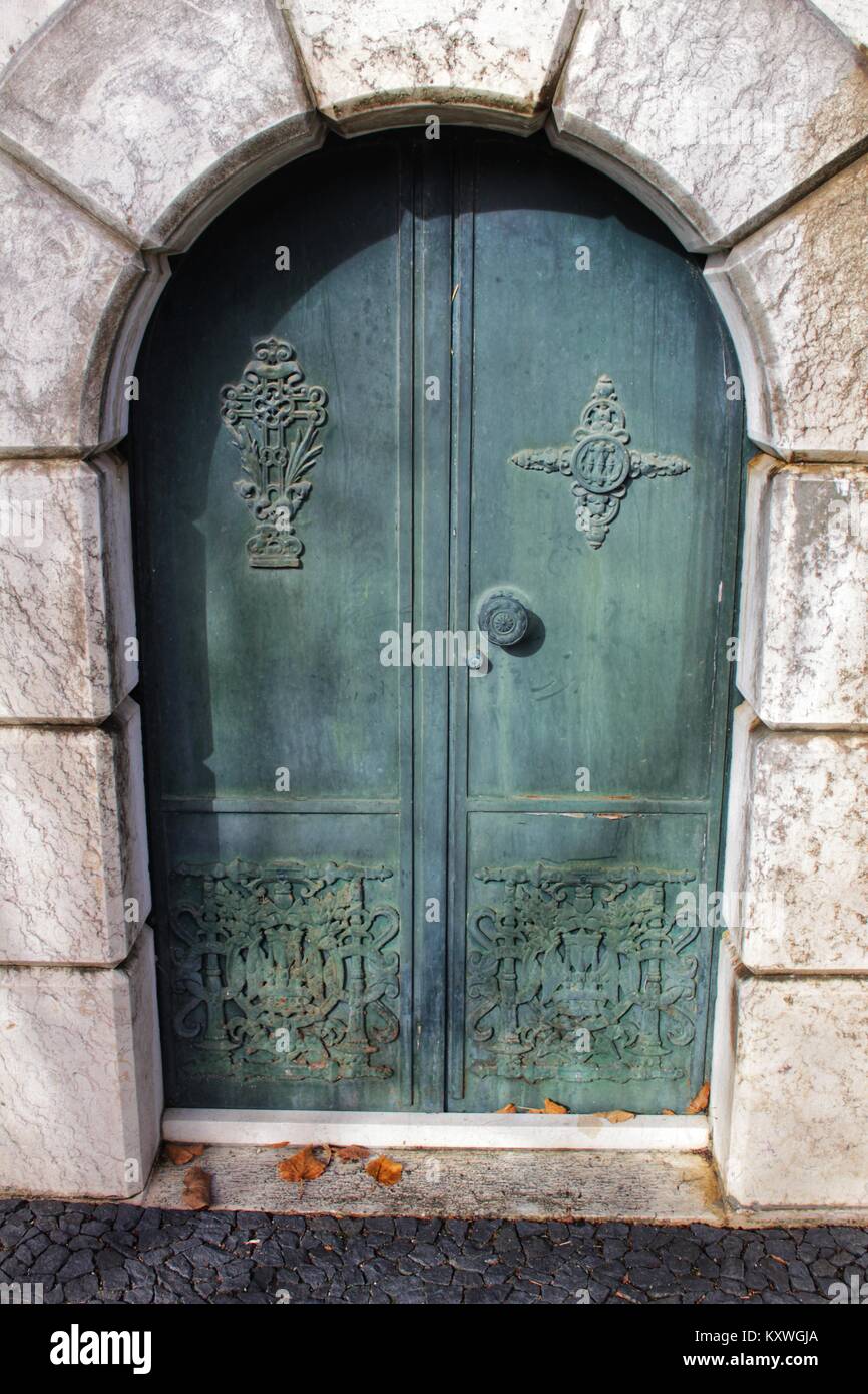 Vintage wrought iron door in cemetery Stock Photo - Alamy