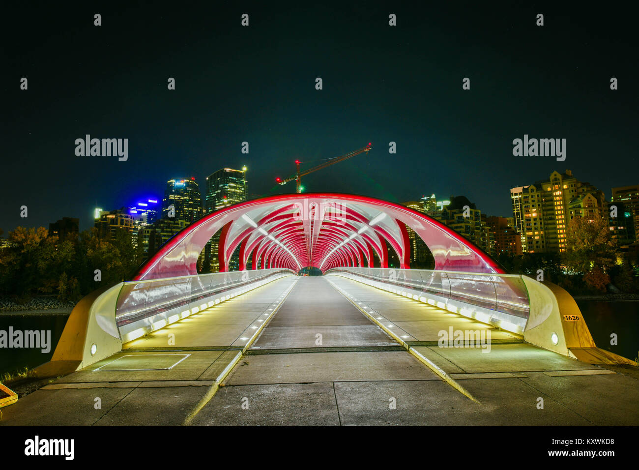 Peace Bridge with Bow River and part of the Calgary downtown in Alberta ...
