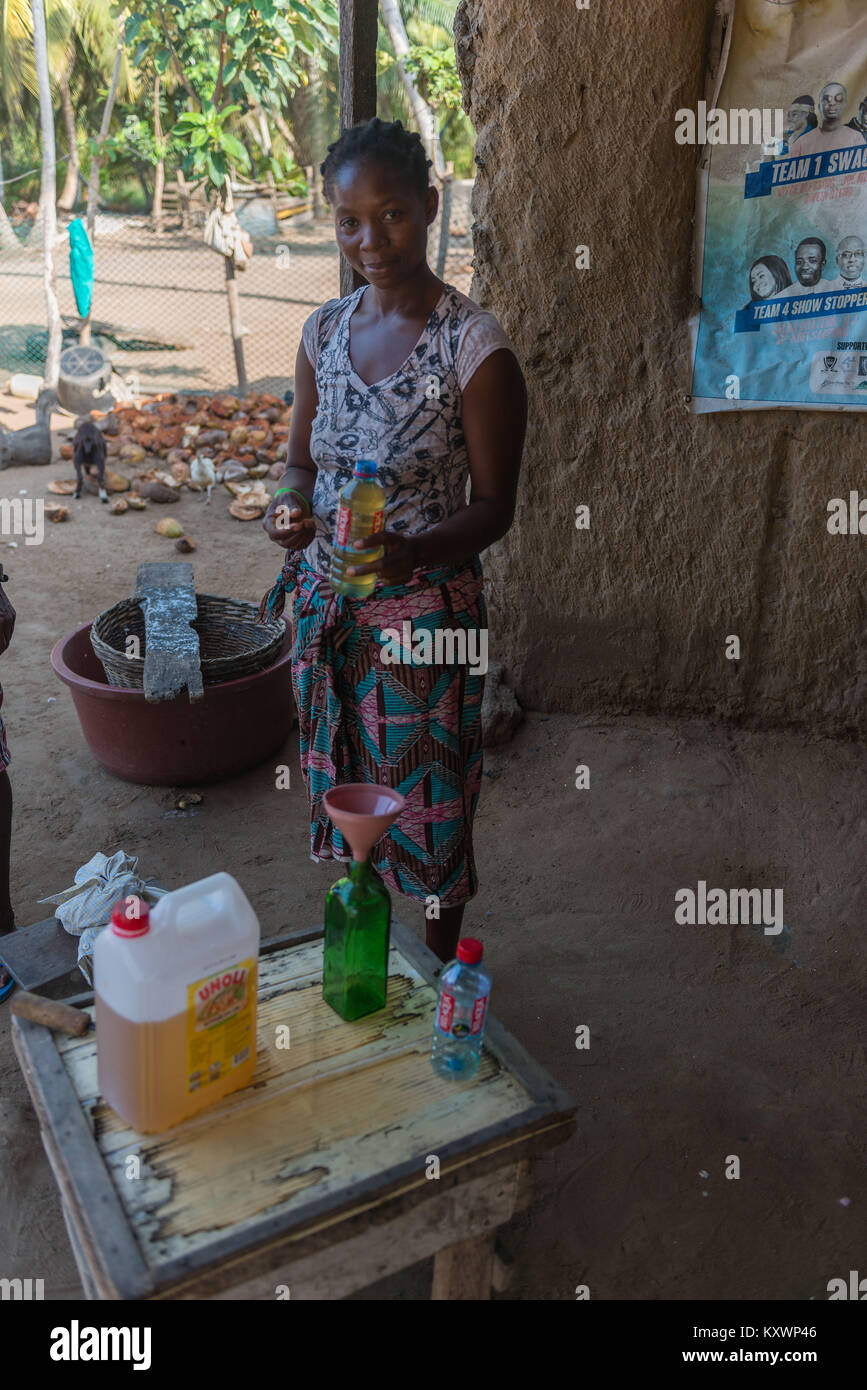The coconut oil is filled into bottles. Production of coconut oil,Aziza ...
