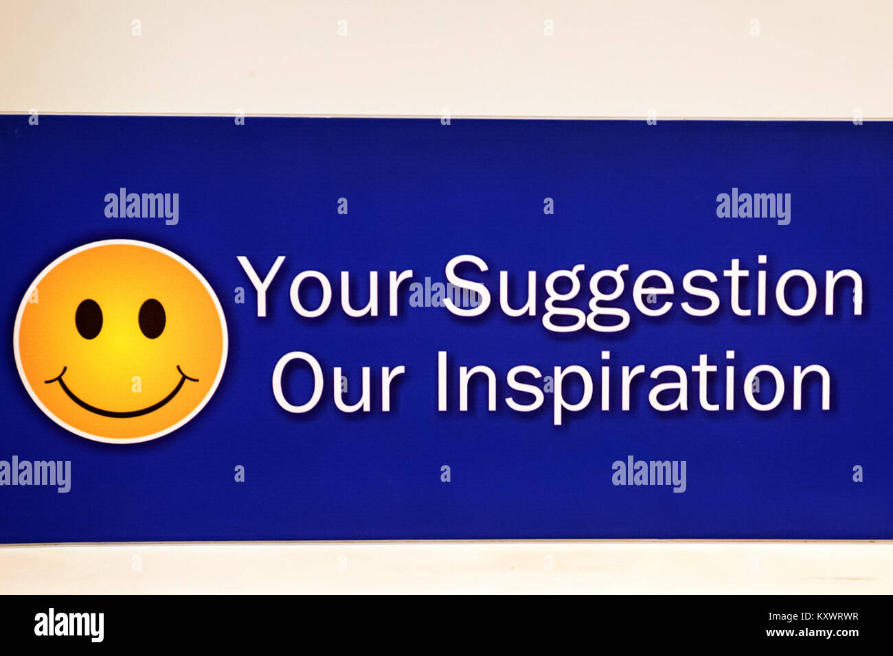 Close up yellow feedback button with smiley face Stock Photo - Alamy