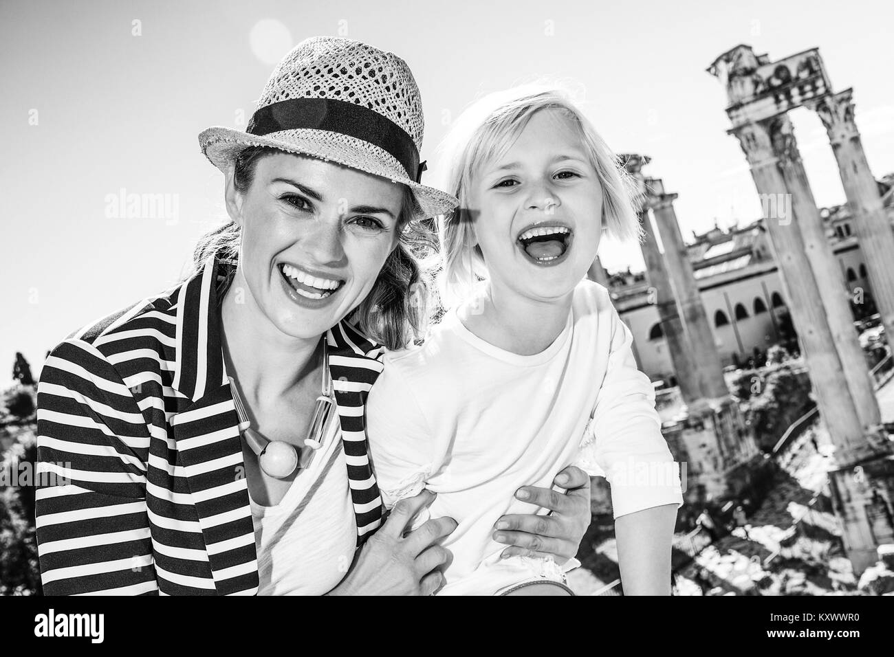 Roman Holiday. smiling stylish mother and daughter tourists in the ...