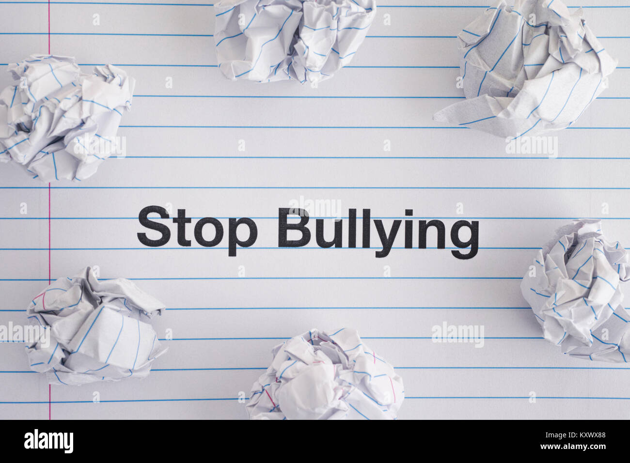 Stop Bullying. Phrase Stop Bullying on notebook sheet with some ...