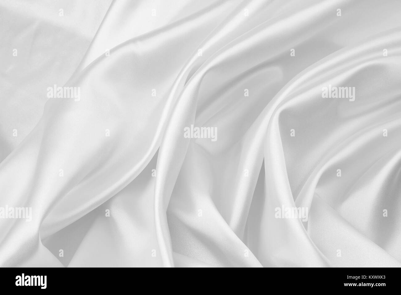 Closeup of rippled white silk fabric Stock Photo - Alamy