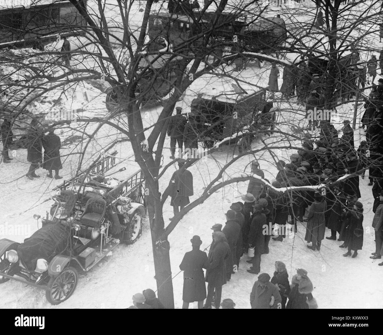 Tank Truck with Snow Plow Cleans the Streets Stock Photo - Alamy