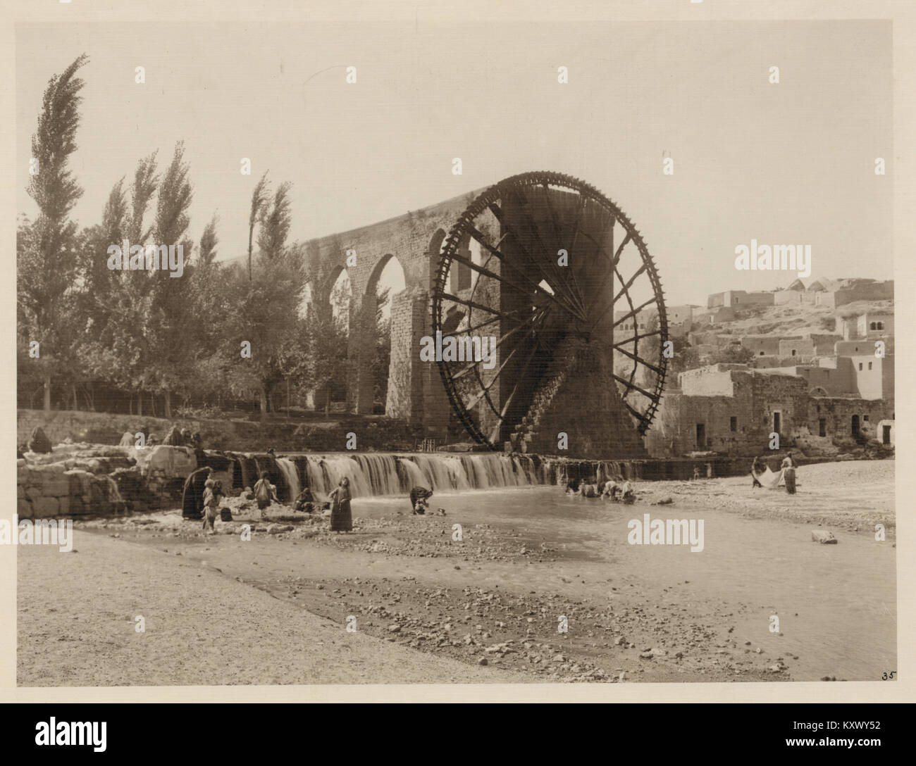 Water Wheel on Orontes River in Syria with Roman Aquaduct Stock Photo ...