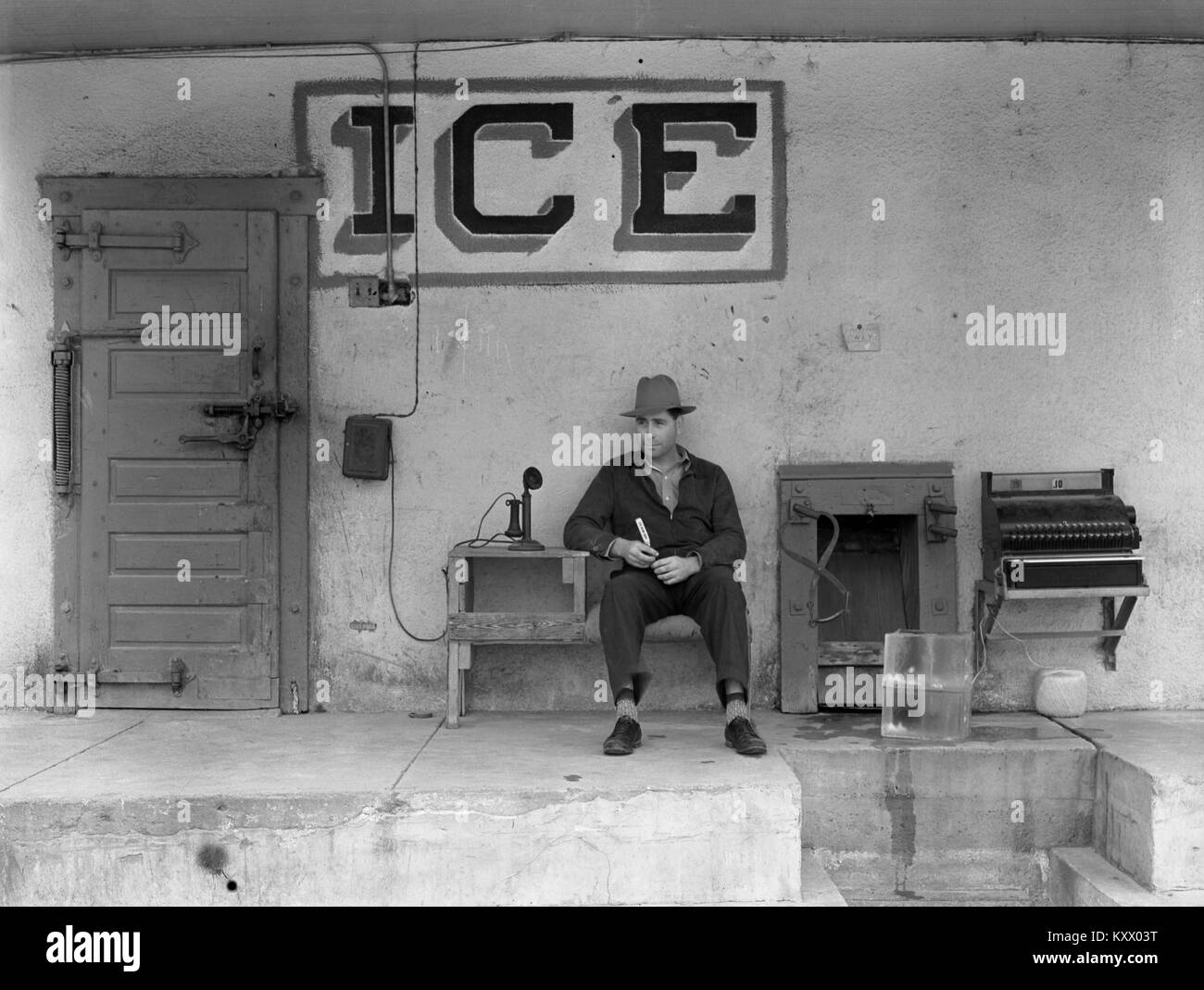 Waiting for a Phone Call for an Ice Delivery Stock Photo - Alamy