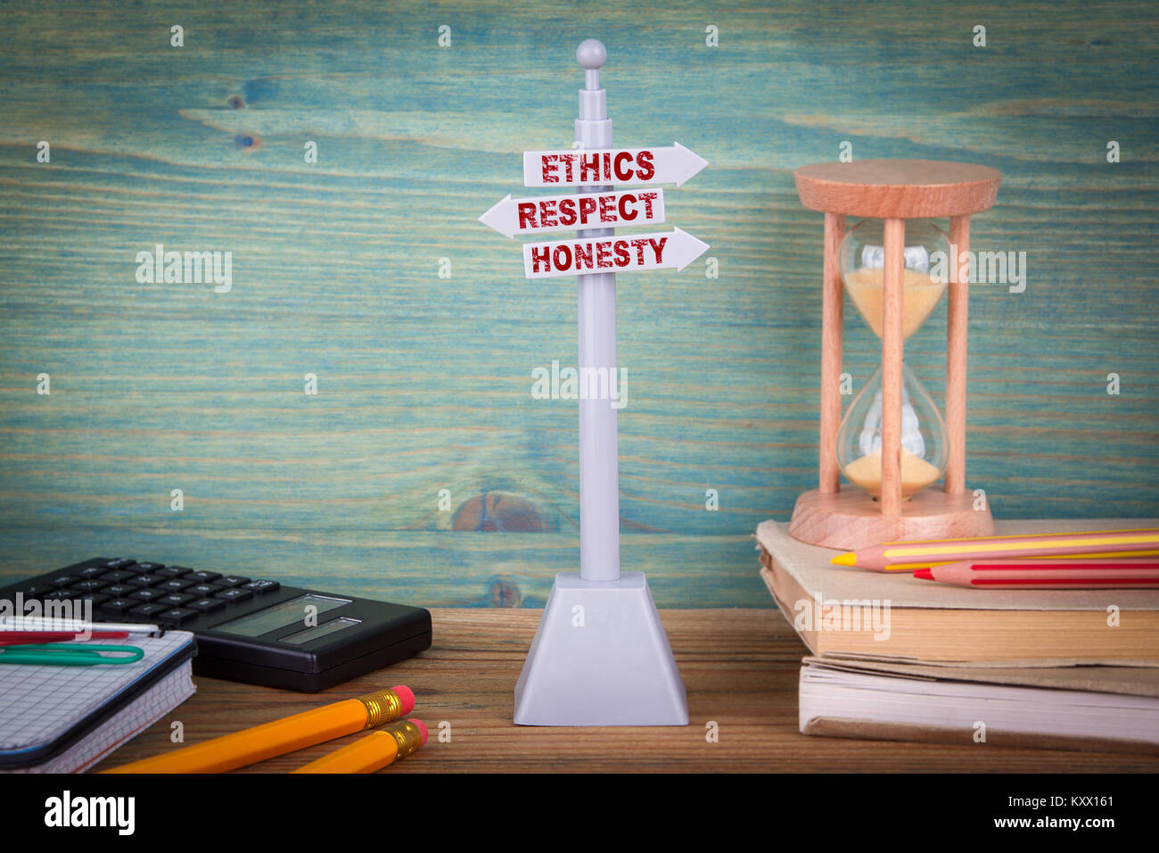 ethics respect honesty, code of conduct. Signpost on wooden table Stock ...