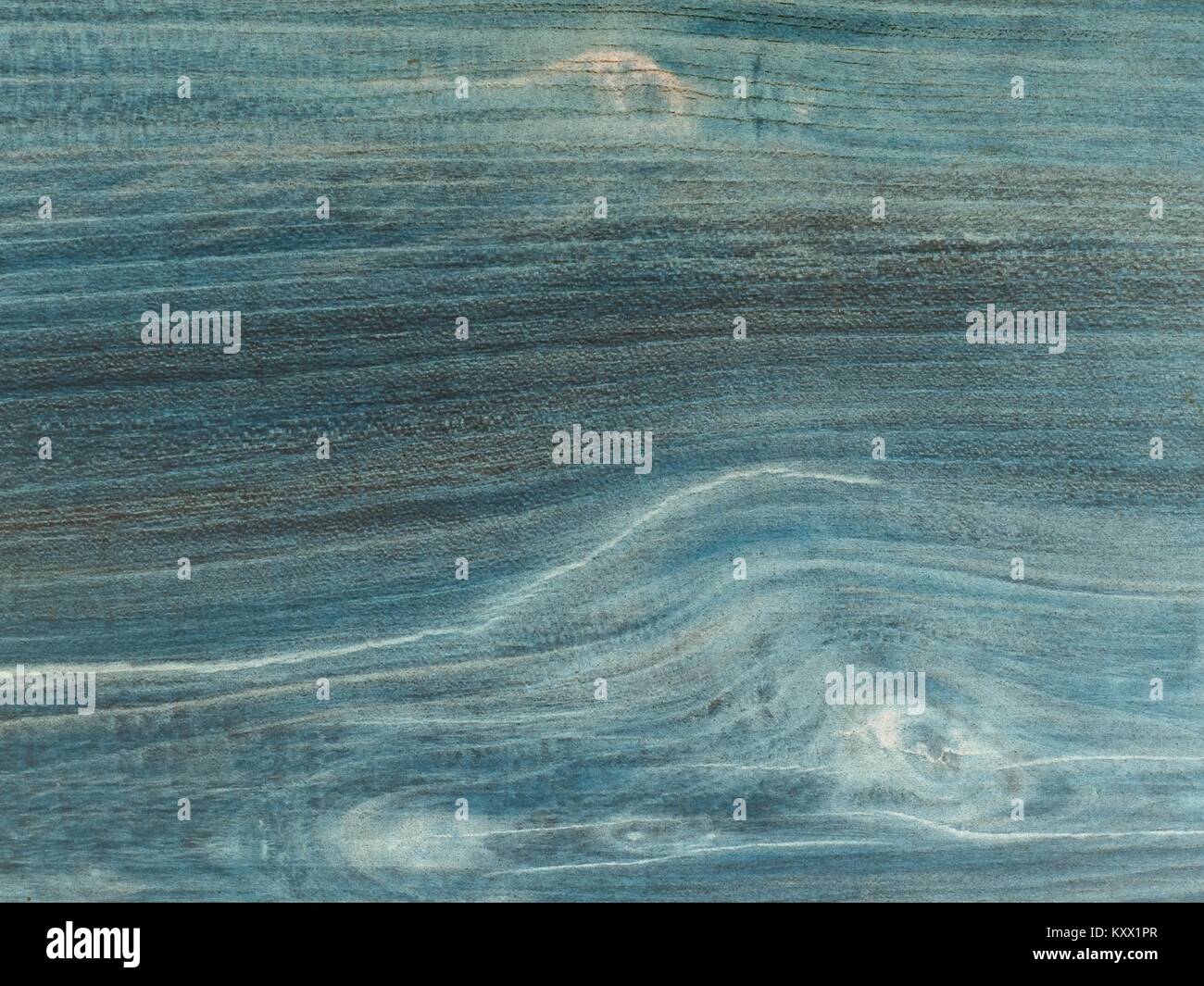 The old table top, worn out stained navy blue with shades. Fine ...