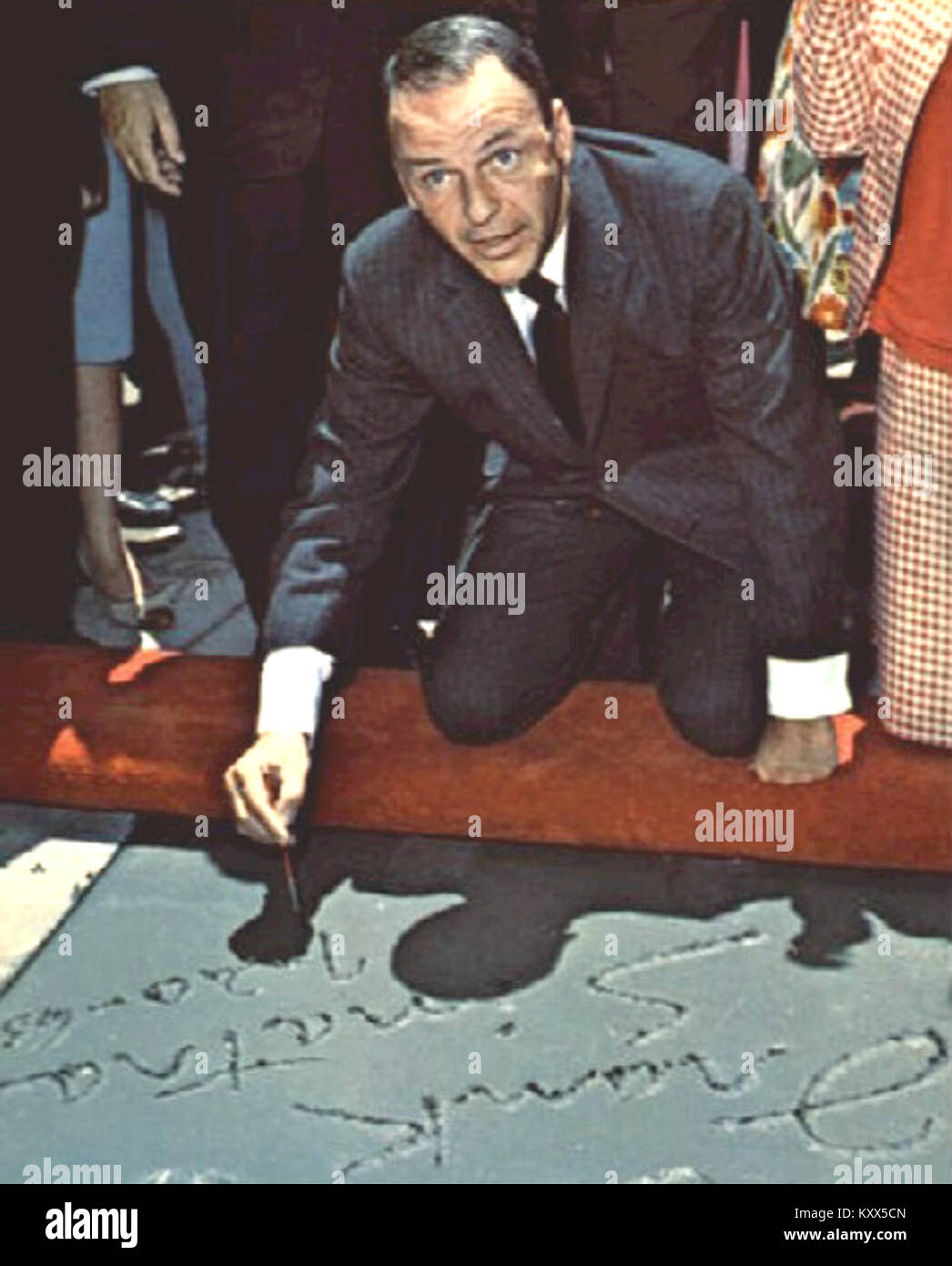 Frank Sinatra participated in a handprint ceremony at Grauman's Chinese ...