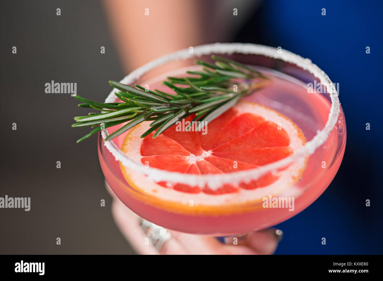 The exotic cocktail and female hands Stock Photo - Alamy