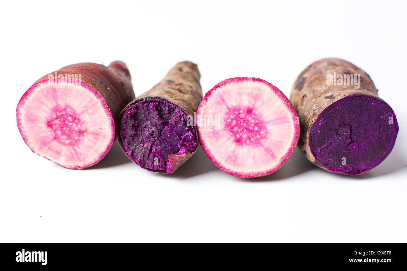 Purple potatoes isolated on white background. Healthy food Stock Photo ...