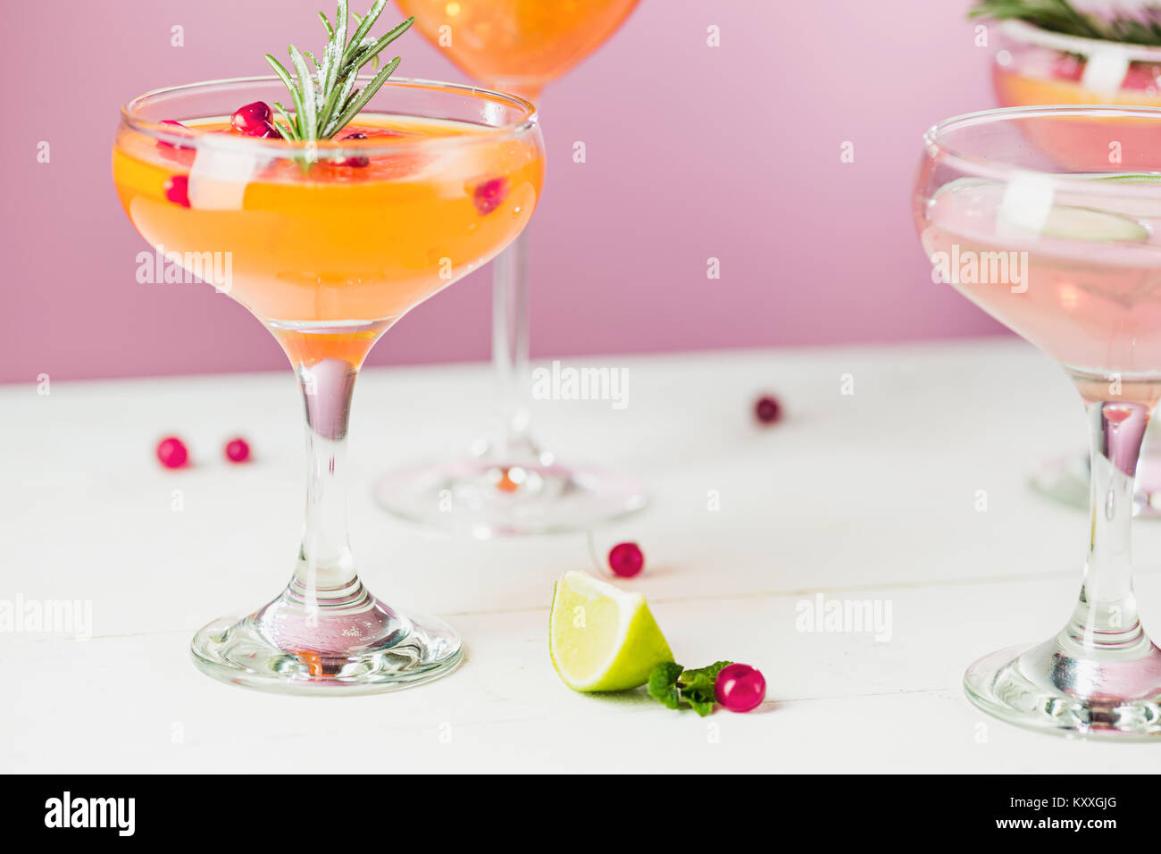 The rose exotic cocktails and fruits on pink Stock Photo - Alamy