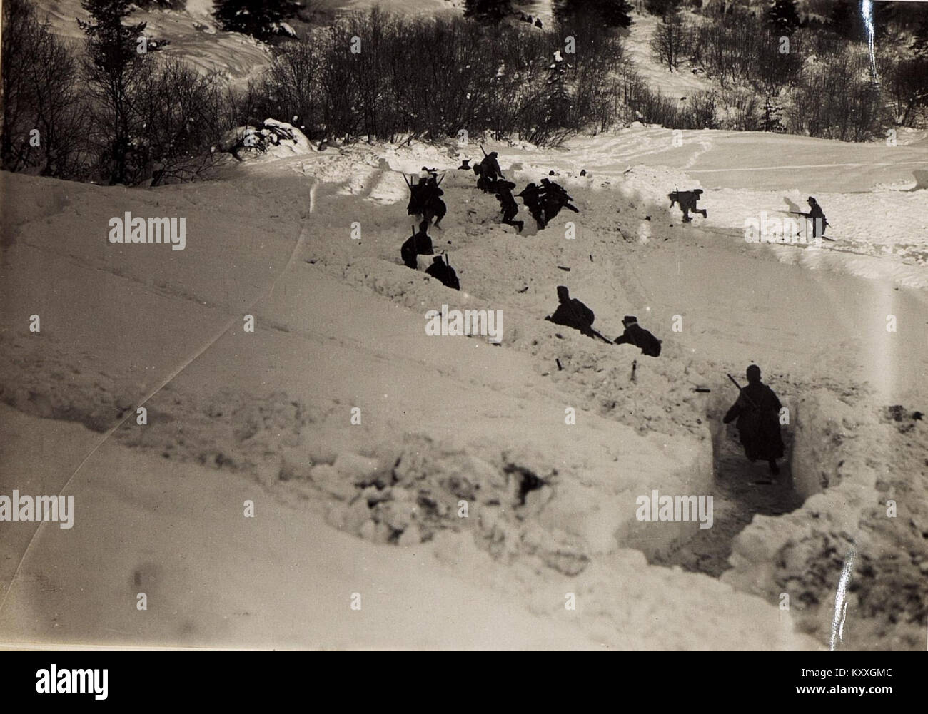 A wartime photograph showing soldiers engaged in a military assault ...