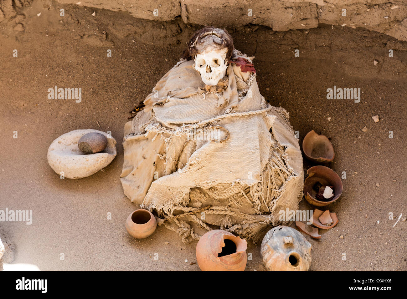 Bones in open inca cemetery in Nazca region , Peru Stock Photo - Alamy