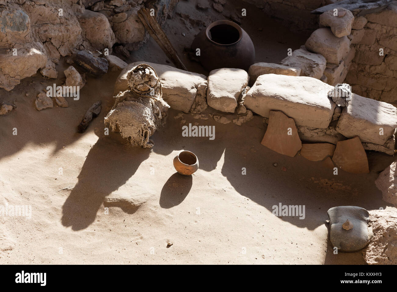 Bones in open inca cemetery in Nazca region , Peru Stock Photo - Alamy